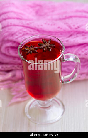 Red Tea (karkade) with a scarf. autumn Stock Photo - Alamy
