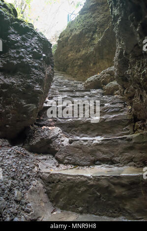 underground stone tunnel to exit cavern Stock Photo - Alamy