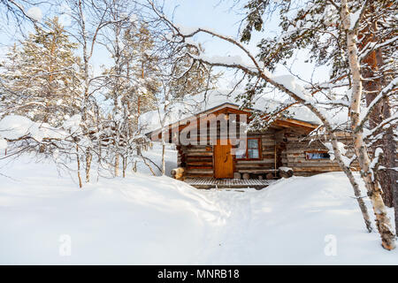 Trees and wooden house covered with snow in sunny winter day Stock ...