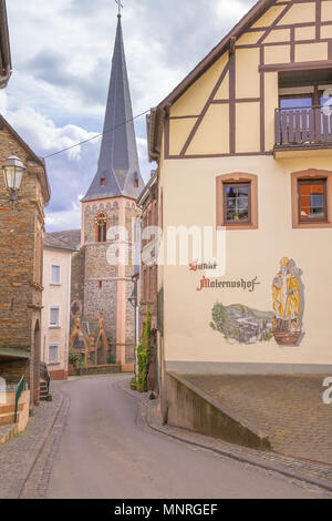 Urzig village on the Mosel between the river Moselle and the vineyards ...