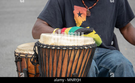 An African musician beating the drum Stock Photo: 23200308 - Alamy