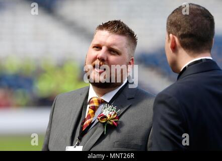 Motherwell Chief Executive Alan Burrows watches the action from the ...