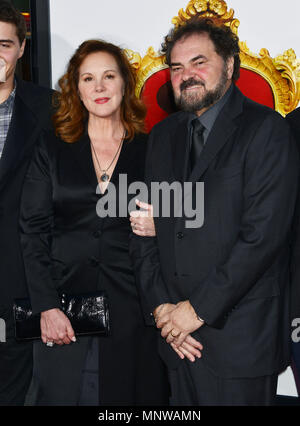 Elizabeth Perkins with husband Julio Macat and daughter arriving at the ...