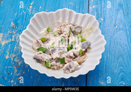 Polish Herring in Sour Cream - Sledzie smietanie, close up Stock Photo ...