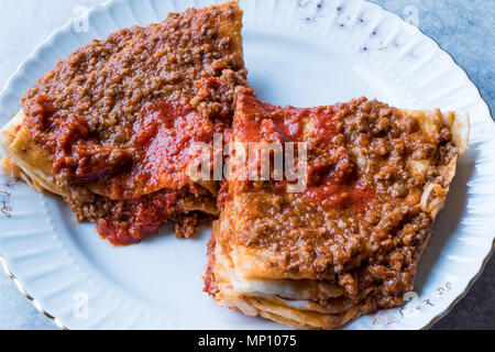 Turkish food Kayseri Yaglama with minced meat, and tomato paste covered ...