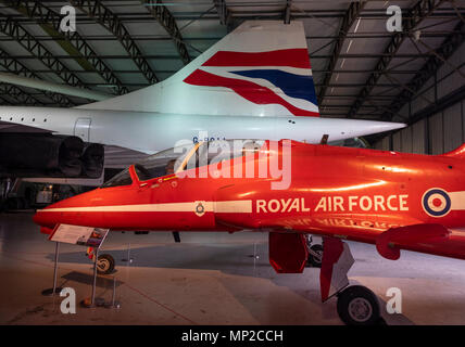British Airways Concorde and Red Arrows Hawk on display in hanger at ...
