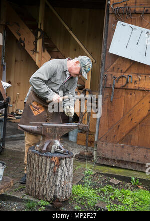 A blacksmith working at the Hopper-Goetschius House and museum in Upper ...