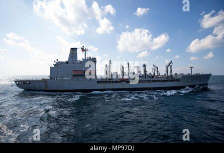 The fleet replenishment oiler USNS Walter S. Diehl (T-AO 193), right ...