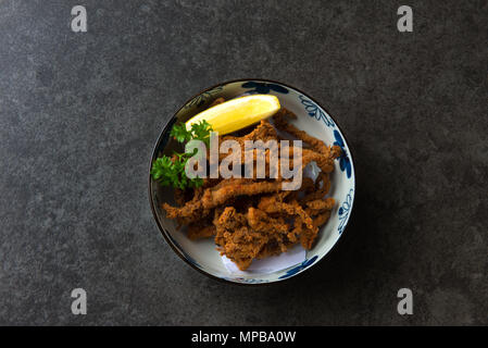 Ika Geso japanese fried spicy squid tentacle Stock Photo - Alamy