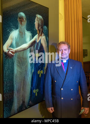 Parish minister Rev Peter Sutton stands alongside the nativity scene in ...