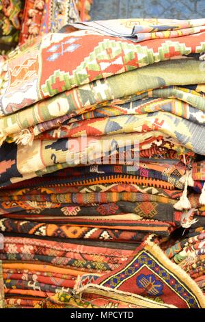 Colourful Turkish materials and clothes and merchandise Stock Photo - Alamy