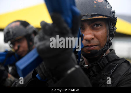 Mauritius National Coast Guard Commandos discuss boarding techniques ...