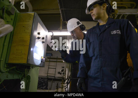 Chief Petty Officer Mark Henricksen and Petty Officer 3rd Class ...