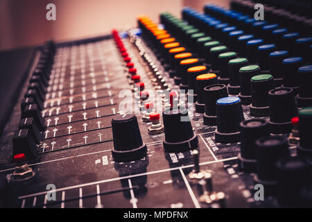 Old analog mixing console. Faders, buttons and sliders Stock Photo - Alamy