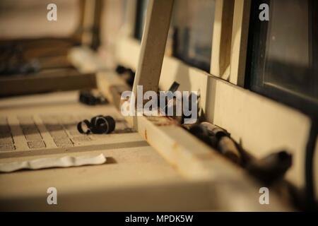 .50 caliber shell casings liter the hood of a vehicle, during Decisive ...