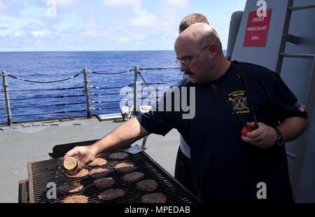 PACIFIC OCEAN (Feb. 13, 2017) Sailors lower a rigid hull inflatable ...