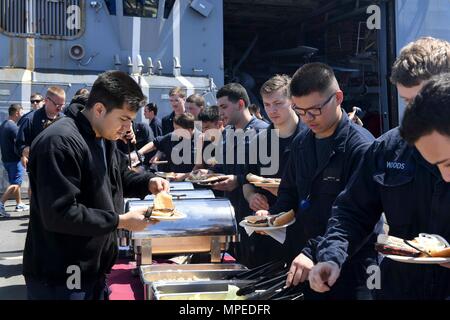 PACIFIC OCEAN (Feb. 13, 2017) Sailors lower a rigid hull inflatable ...