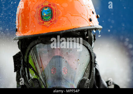 Miami-Dade Fire Rescue (MDFR) Fire Lt. Tammy Napoles holds her son ...