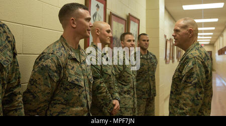 U.S. Marines with The Basic School (TBS) take off from the start line ...