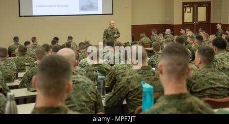 U.S. Marines with The Basic School (TBS) take off from the start line ...