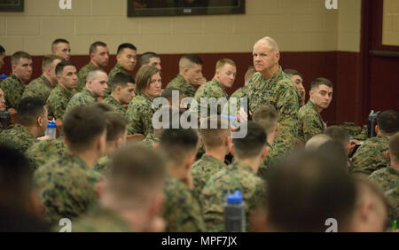 U.S. Marines with The Basic School (TBS) take off from the start line ...