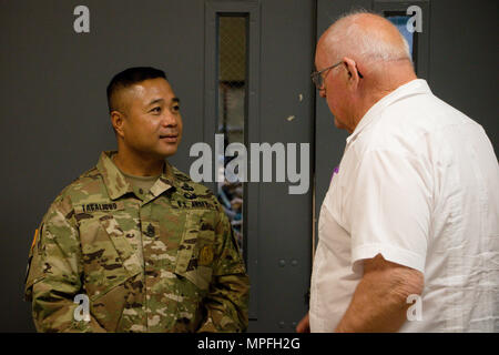 Retired Army Sergeant Major Walter Bruce conducted the roll call for ...