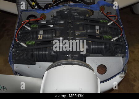 A Lycoming O-360 engine mounted on a Piper Cherokee shows the important ...