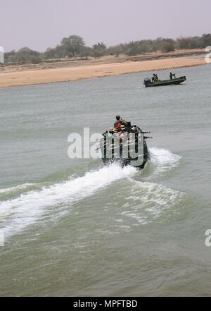 Chadian soldiers participate in beach infiltration exercises as part of ...