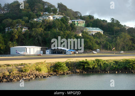 The runway of George F L Charles airport. The airport is the smaller of ...