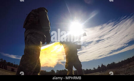Back blast from a M136 AT4 rocket launcher create a heat wave as a ...