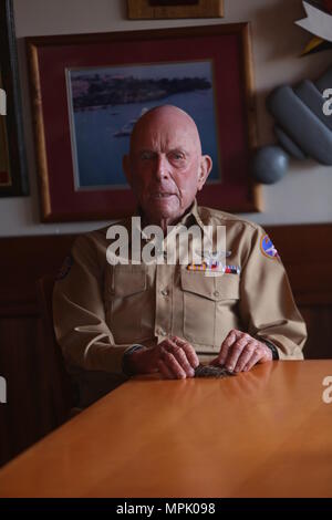 A World War II veteran giving a salute in honour of those who have ...