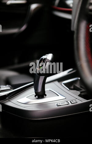 Car automatic gear stick close up view with dashboard Stock Photo - Alamy