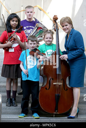 First Minister Nicola Sturgeon with nine month old Amelia Mackinnon as ...