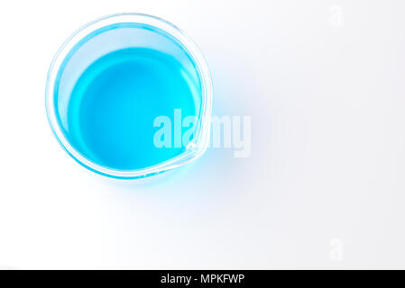 Glass beaker of copper sulfate solution (copper chloride) blue liquid ...