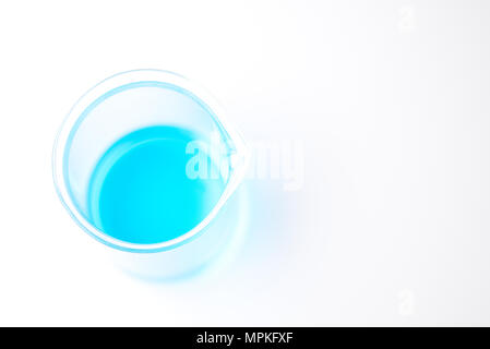 Glass beaker of copper sulfate solution (copper chloride) blue liquid ...