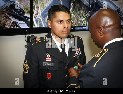 Army Reserve Staff Sgt. Erick Guzman, information technology staff ...