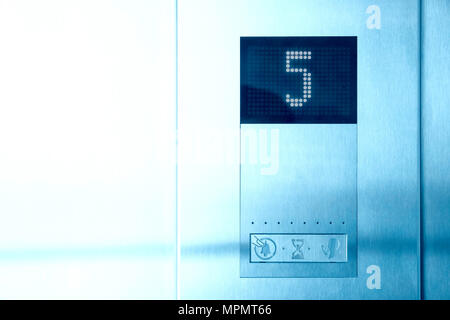 Elevator display with number five floor Stock Photo - Alamy