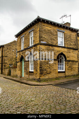 Cobbled streets of Saltaire village in West Yorkshire. Saltaire is a ...