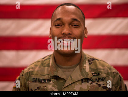 U.S. Army Sgt. Torrance Saunders, assigned to 1st Platoon, 982nd Combat ...