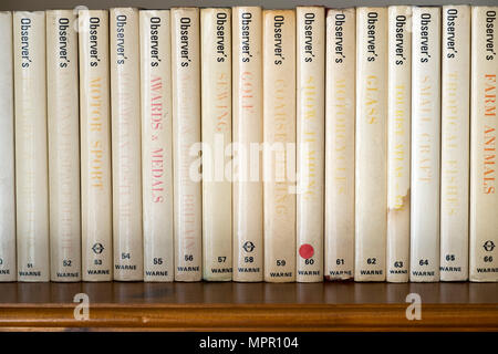 A large collection of vintage Observers books on a bookshelf. Observer ...