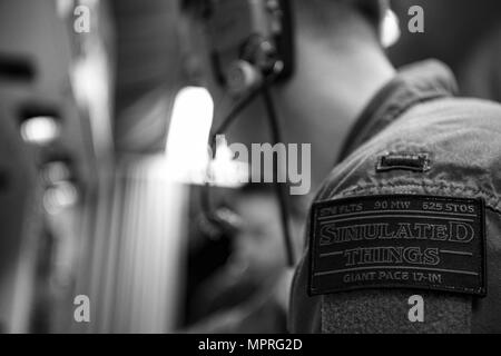 The 576th Flight Test Squadron patch is displayed on an Airman’s arm at ...