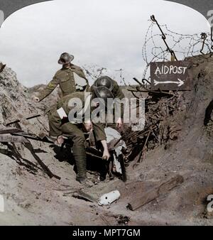Carrying a wounded soldier to a first aid post, Passchendaele, Belgium ...