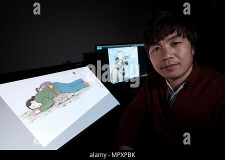 North Korean defector and cartoonist Choi Sung-Guk watching on a ...