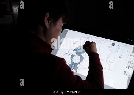 North Korean defector Choi Sung-Guk posing next to a drawing on a ...