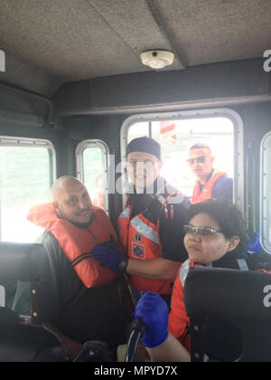 A Coast Guard 27-foot Special Purpose Craft-Shallow Water boat crew and ...