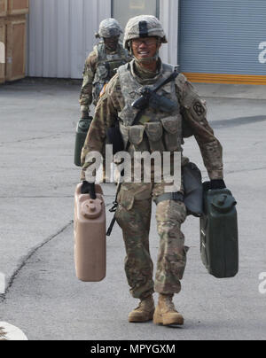 U.S. Army South Soldiers assemble a DRASH tent during a contingency ...