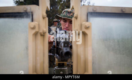 Sailors man a M240B machine gun during a Surface Warfare Advanced ...