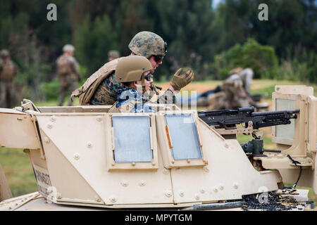 Heavy armor and High-Mobility Multipurpose Wheeled Vehicles (HMMWV), on ...