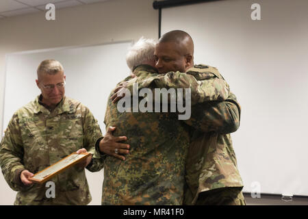 Commander of the 48th Chemical Brigade, Col W.M. Bochat, receives a ...