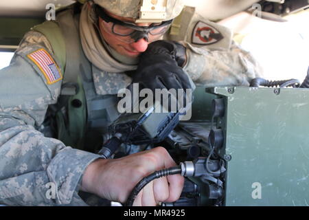 Spc. Tailor Riskowski, a signal support systems specialist with the ...